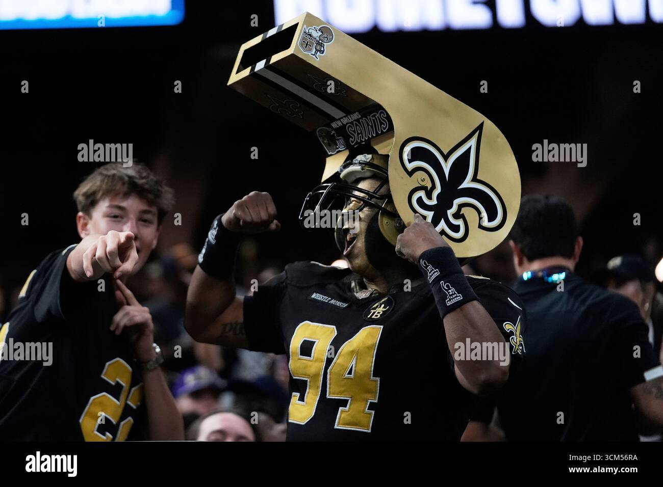 New Orleans Saints fans cheer during the second half of an NFL football ...