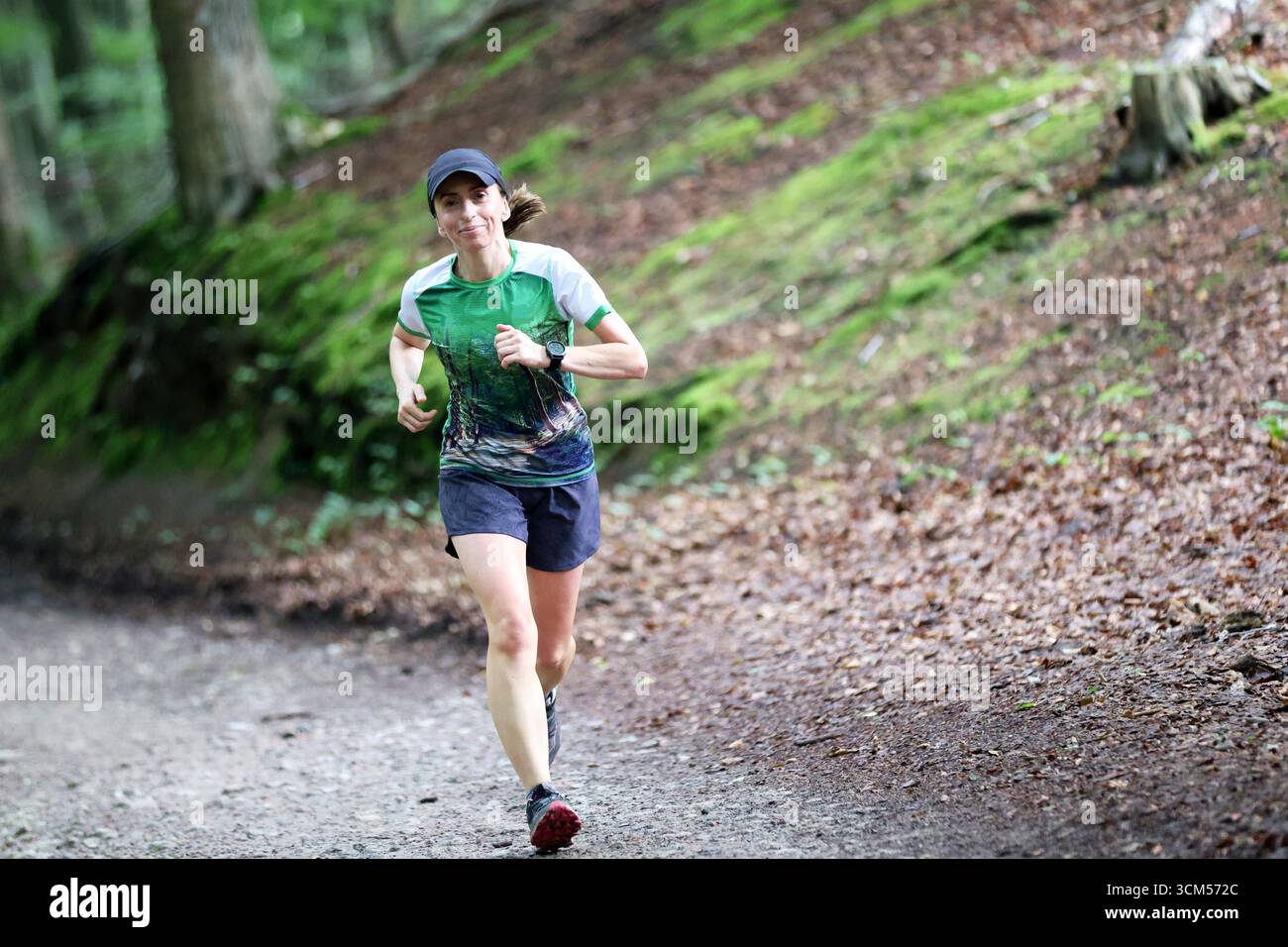 Sport runner woman in running hi-res stock photography and images - Alamy