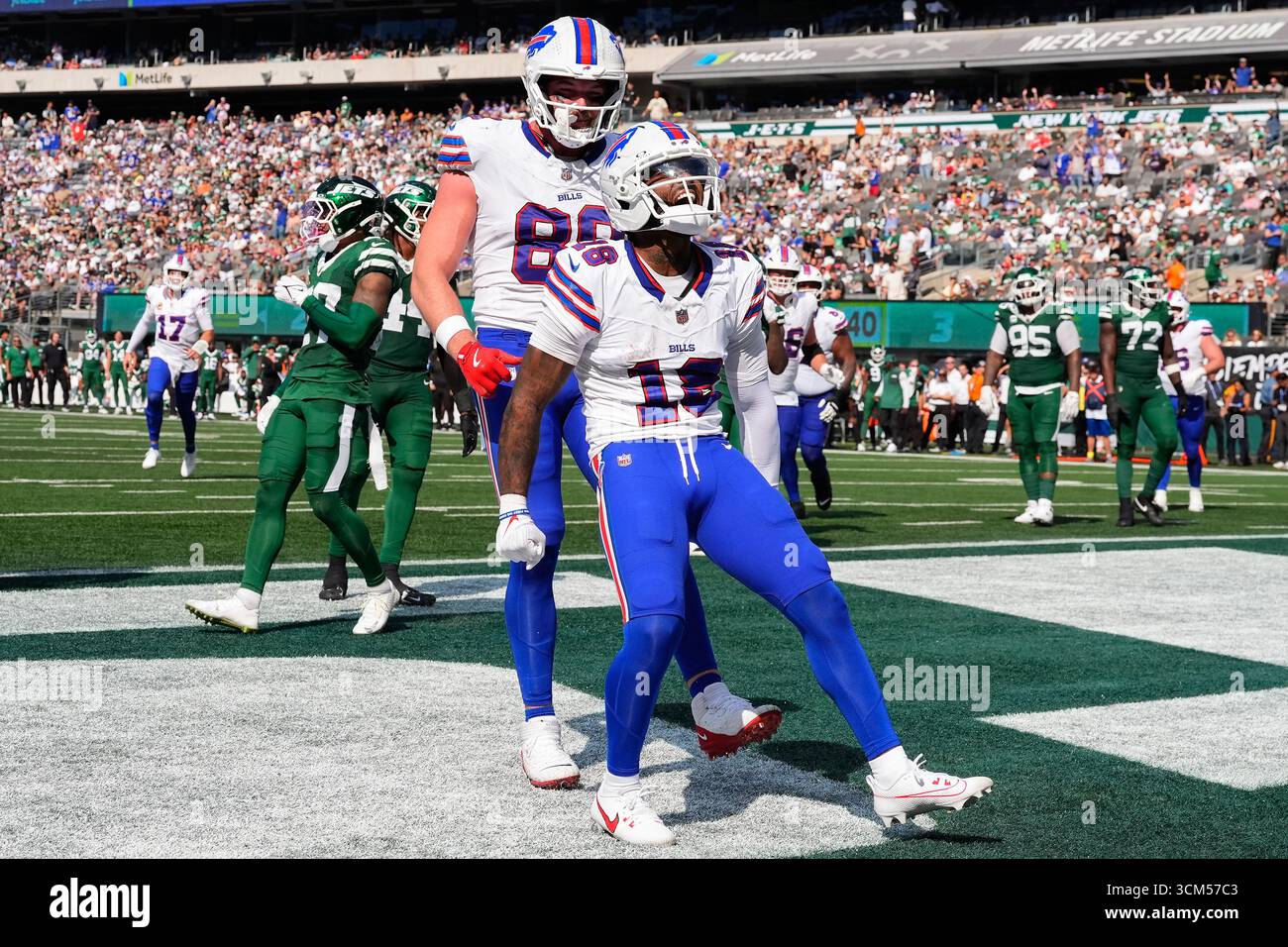 Buffalo Bills wide receiver Elijah Moore (18) reacts after scoring a ...