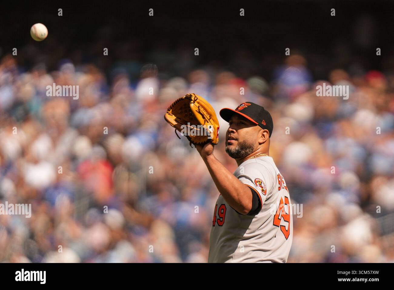 Baltimore Orioles pitcher Albert Suárez takes the ball as he works ...