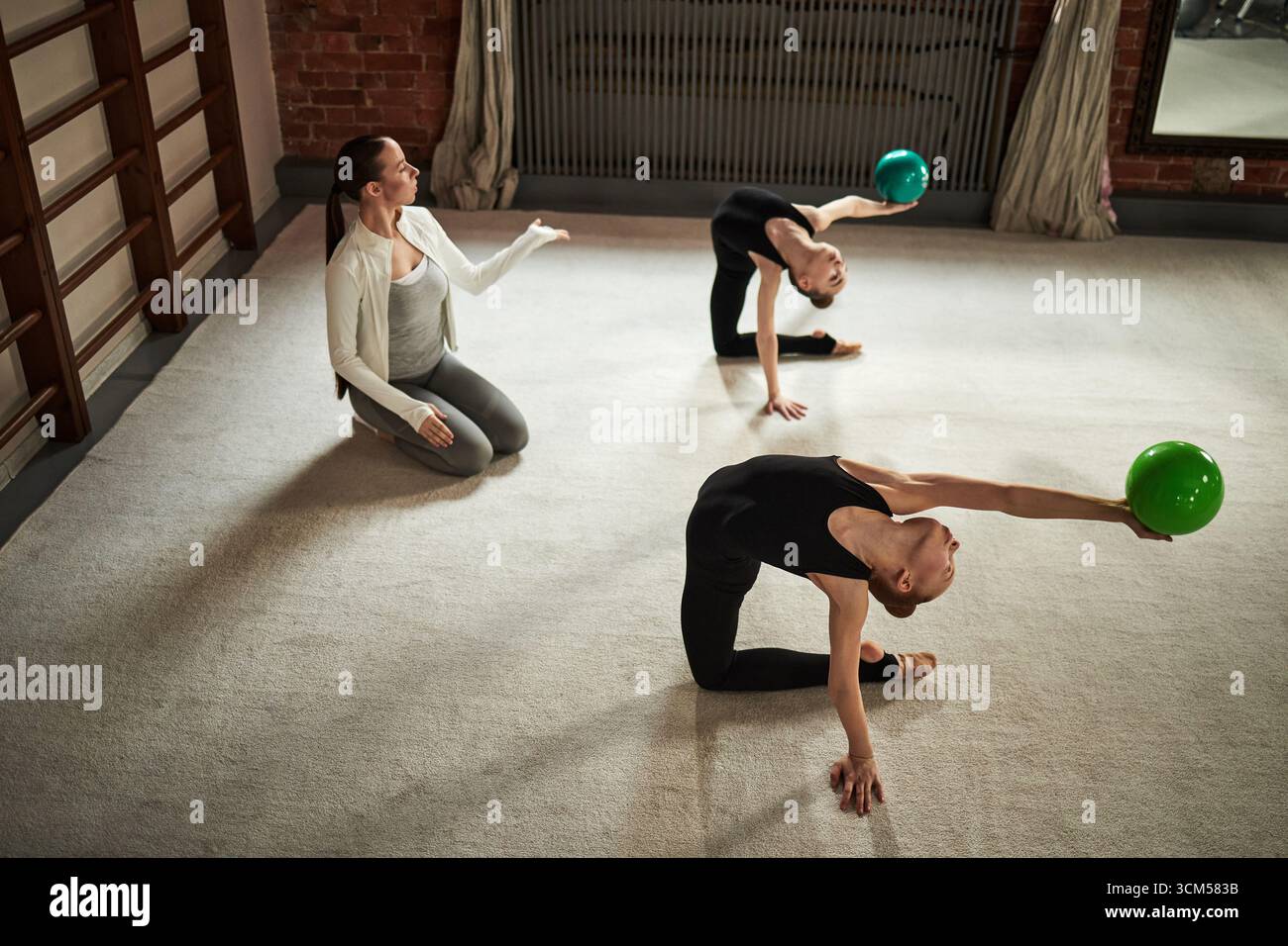 Caucasian girl gymnast performing hi-res stock photography and images ...
