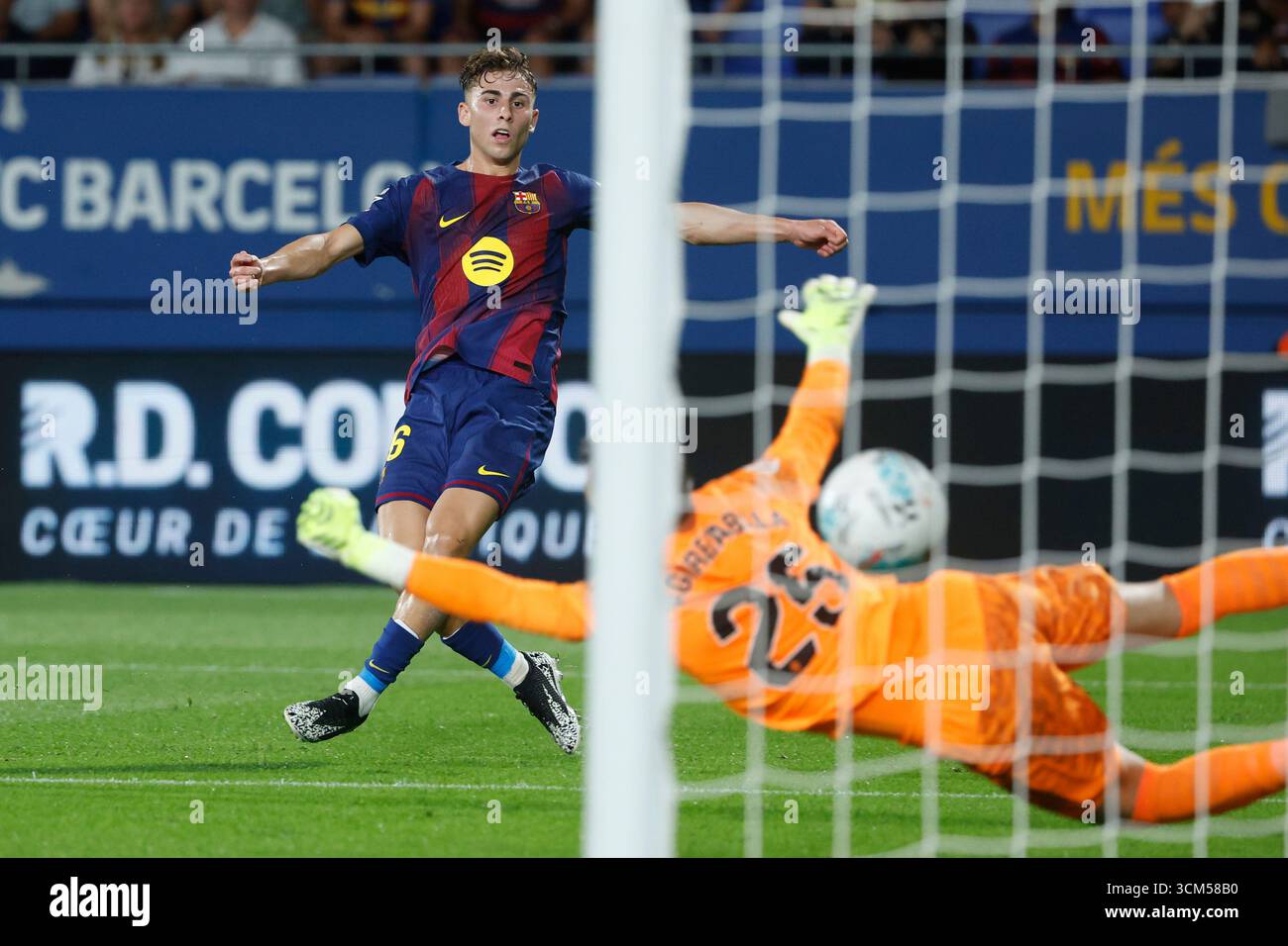 Barcelona's Fermin Lopez scores his side's opening goal during a ...
