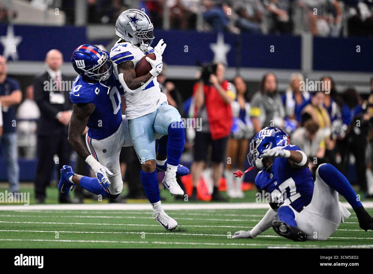Dallas Cowboys' Trent Sieg (44) is stopped after catching a pass by New ...