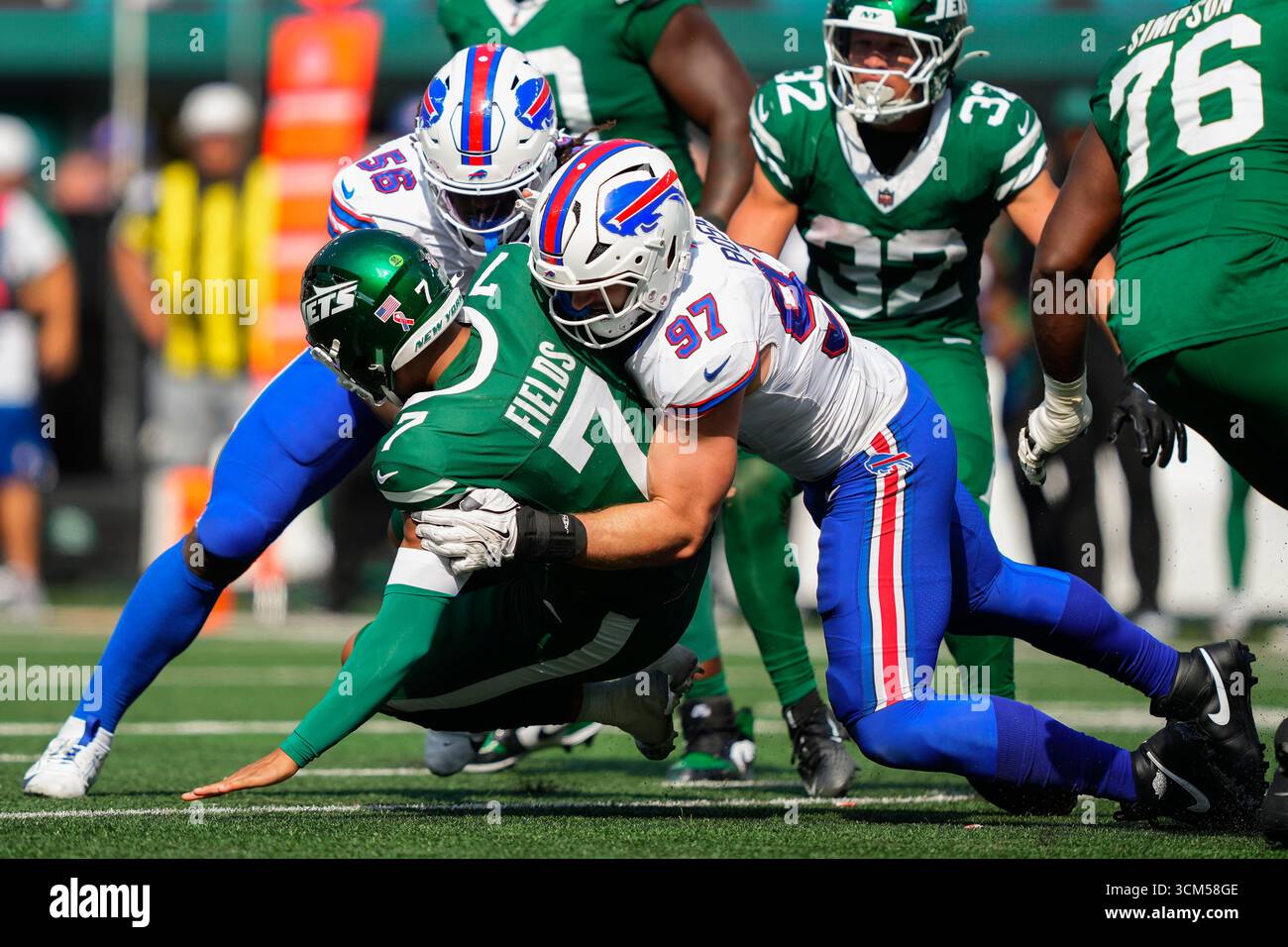 New York Jets quarterback Justin Fields (7) is sacked by Buffalo Bills ...