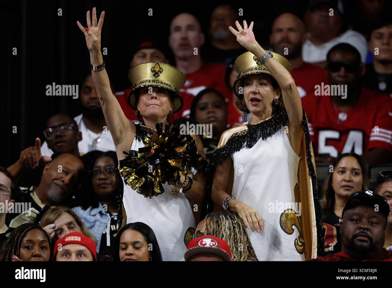New Orleans Saints fans cheer during the second half of an NFL football ...