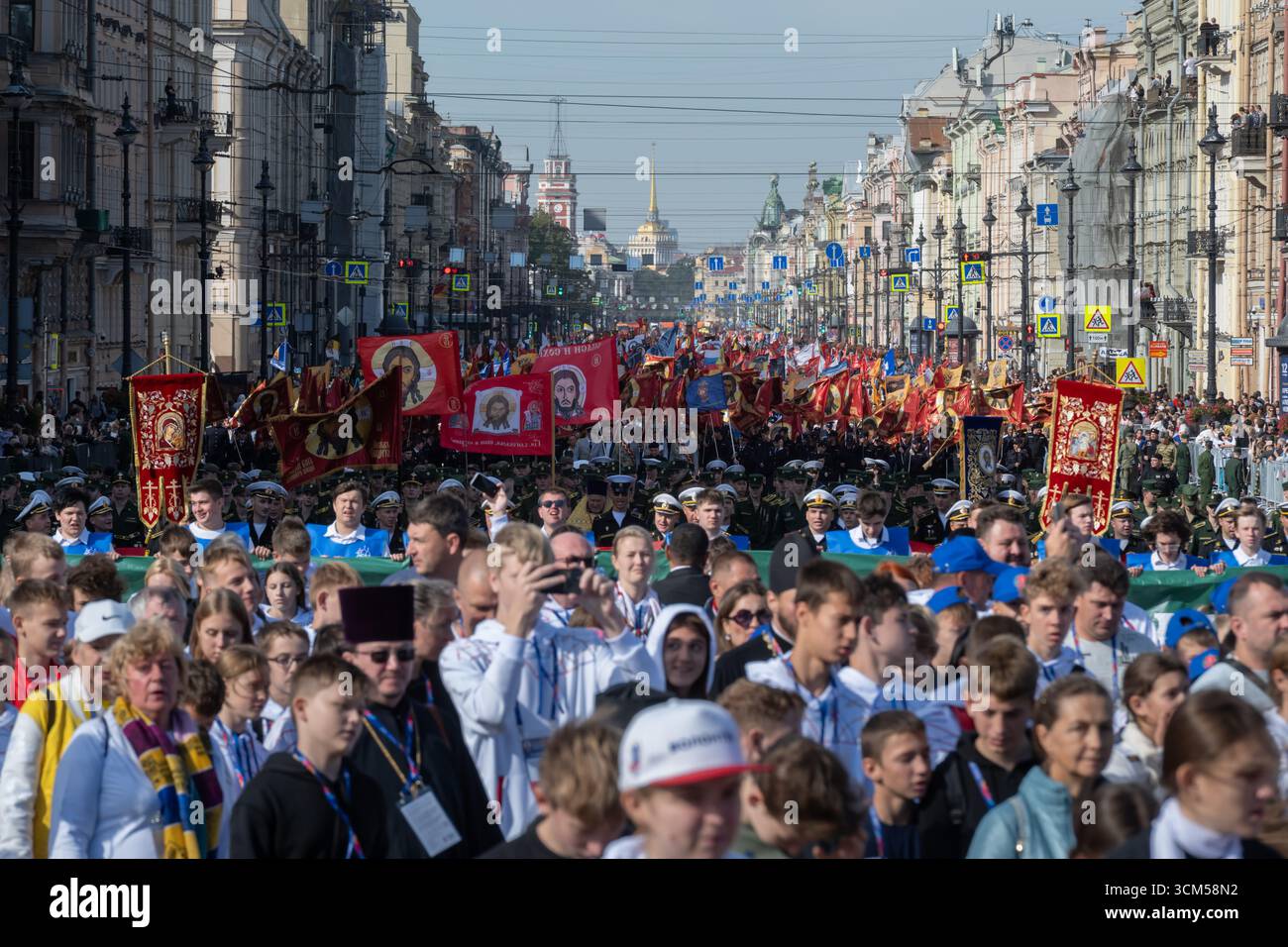 Orthodox believers and priests take part in a religious procession ...