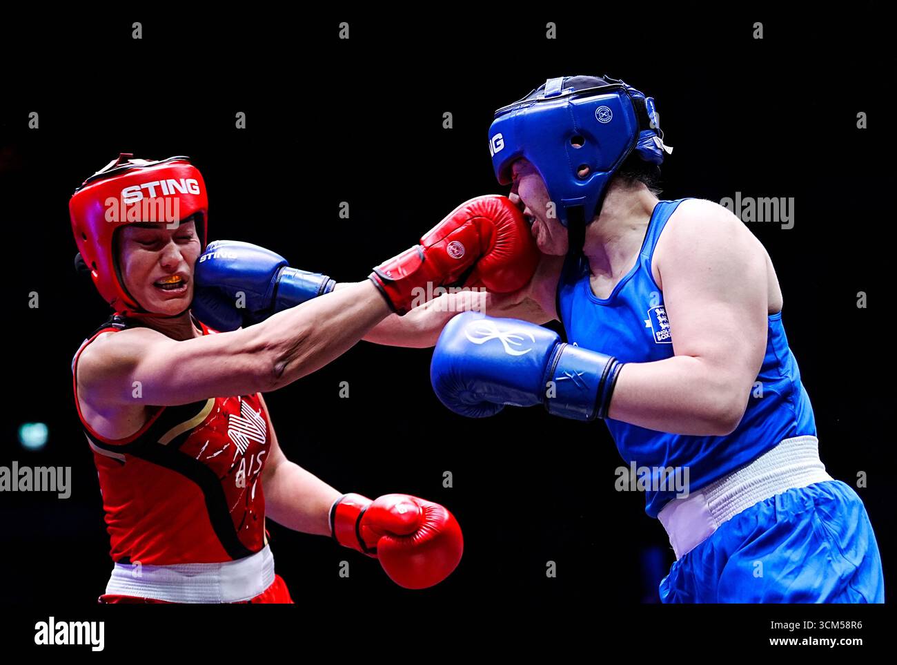 Australia's Eseta Flint (left) and England's Emily Asquith in the Women ...