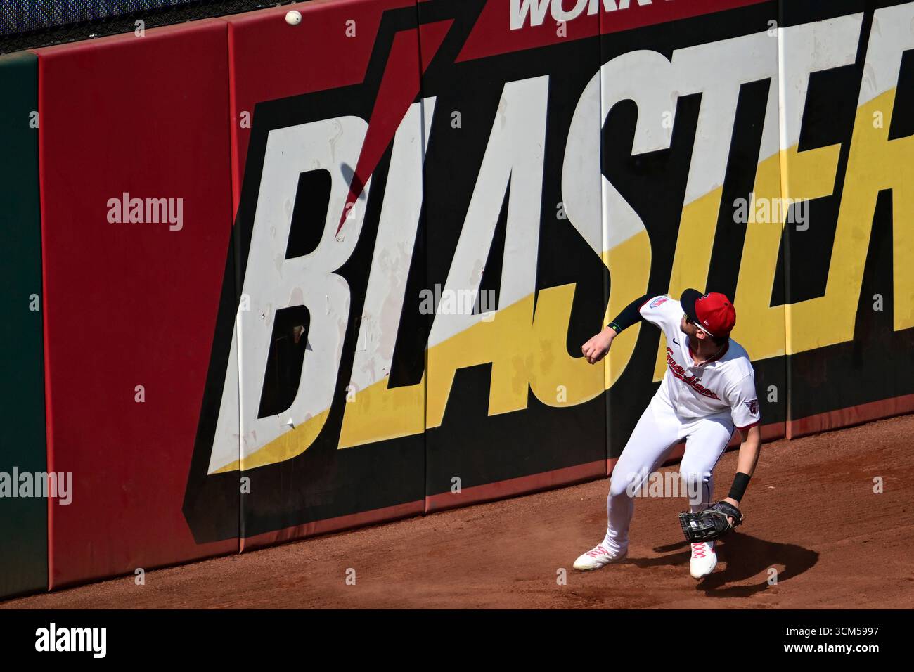 Cleveland Guardians center fielder Nolan Jones fields a ball hit by ...