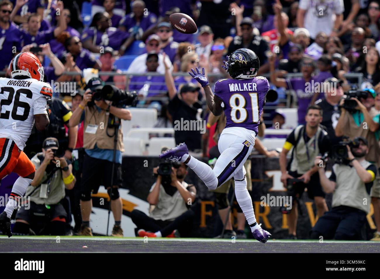 Baltimore Ravens wide receiver Devontez Walker scores against the ...