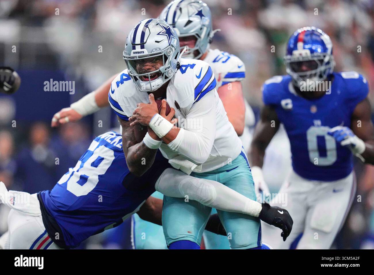 Dallas Cowboys quarterback Dak Prescott (4) is tackled after running ...
