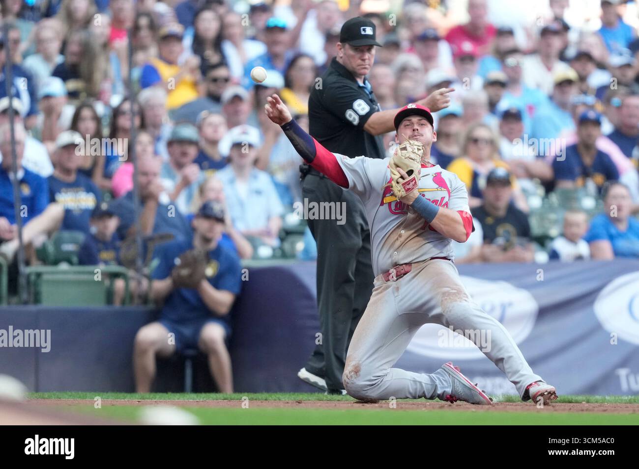 St. Louis Cardinals' Nolan Gorman throws a Milwaukee Brewers runner out ...