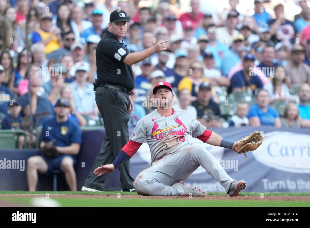 St. Louis Cardinals' Nolan Gorman throws a Milwaukee Brewers runner out ...