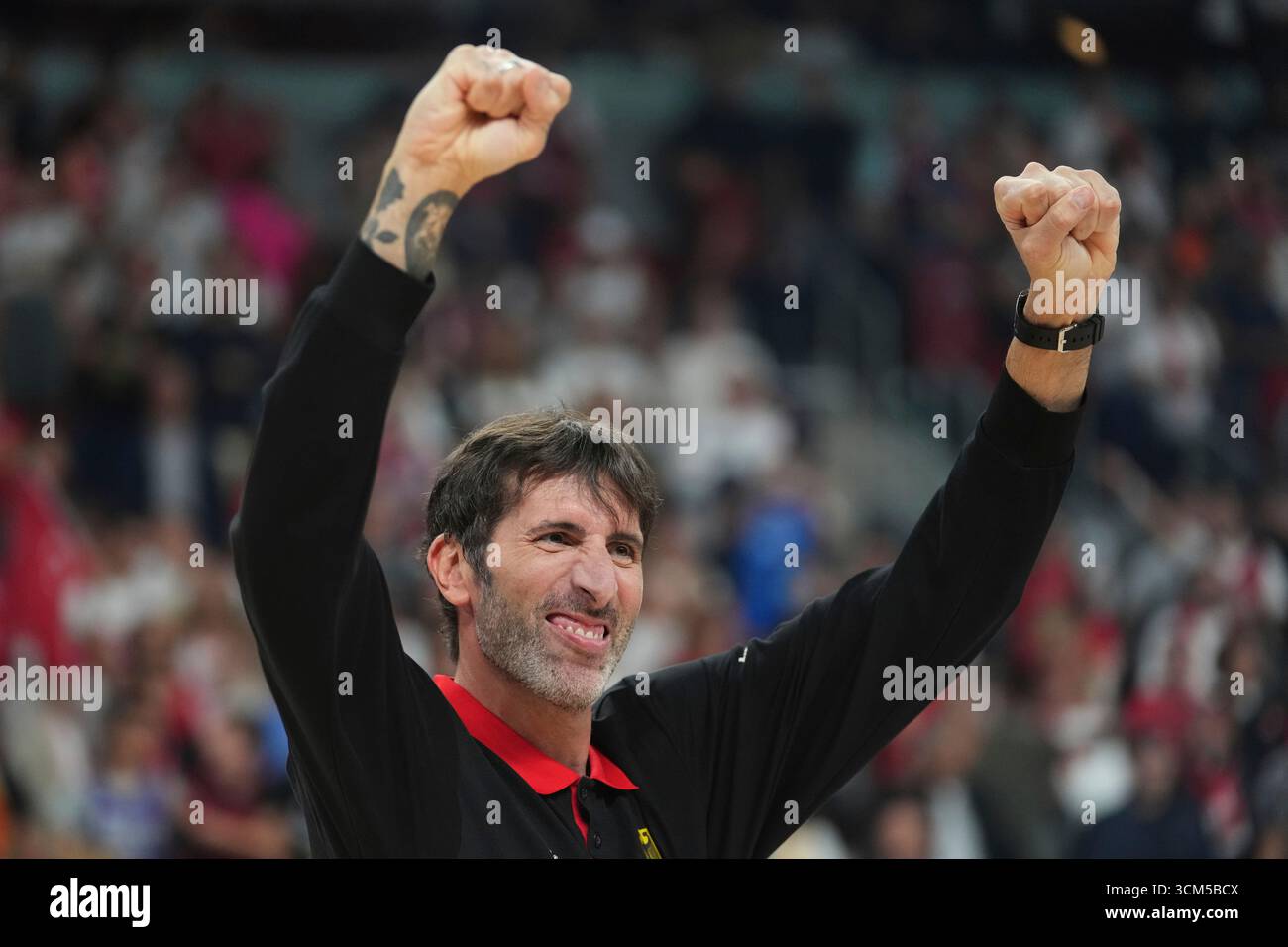 Germany's head coach Alex Mumbru celebrates as they win the Eurobasket ...