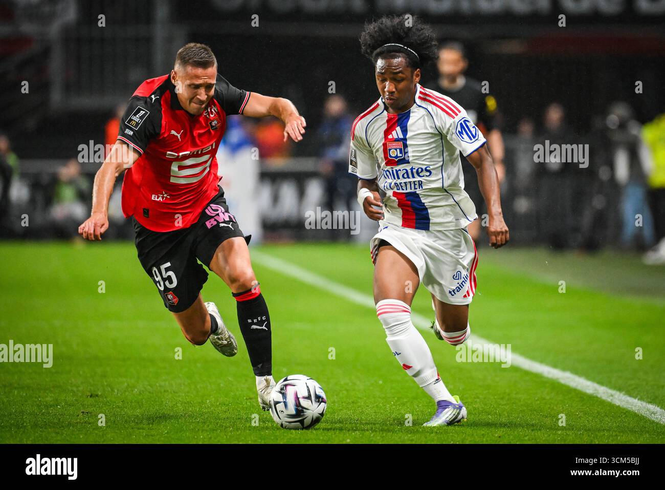 Przemyslaw FRANKOWSKI of Rennes and Malick FOFANA of Lyon during the ...