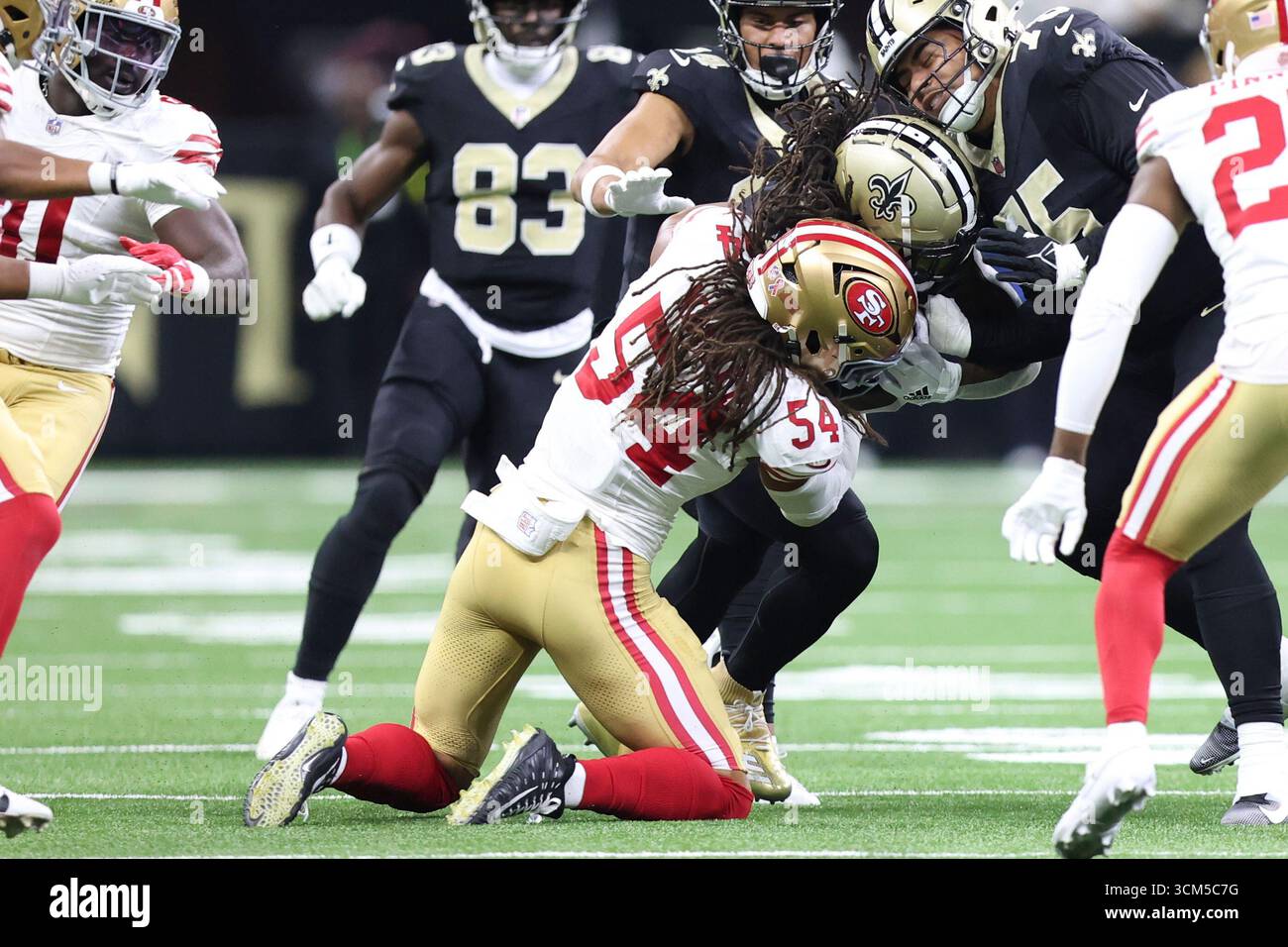 San Francisco 49ers linebacker Fred Warner (54) tackles New Orleans ...
