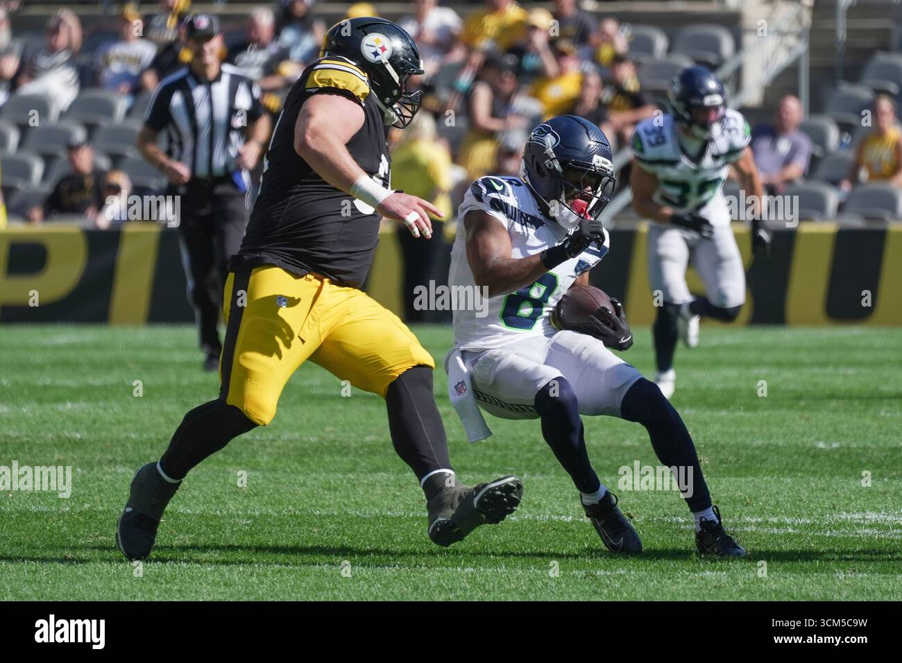 Seattle Seahawks safety Coby Bryant (8) is stopped by Pittsburgh ...