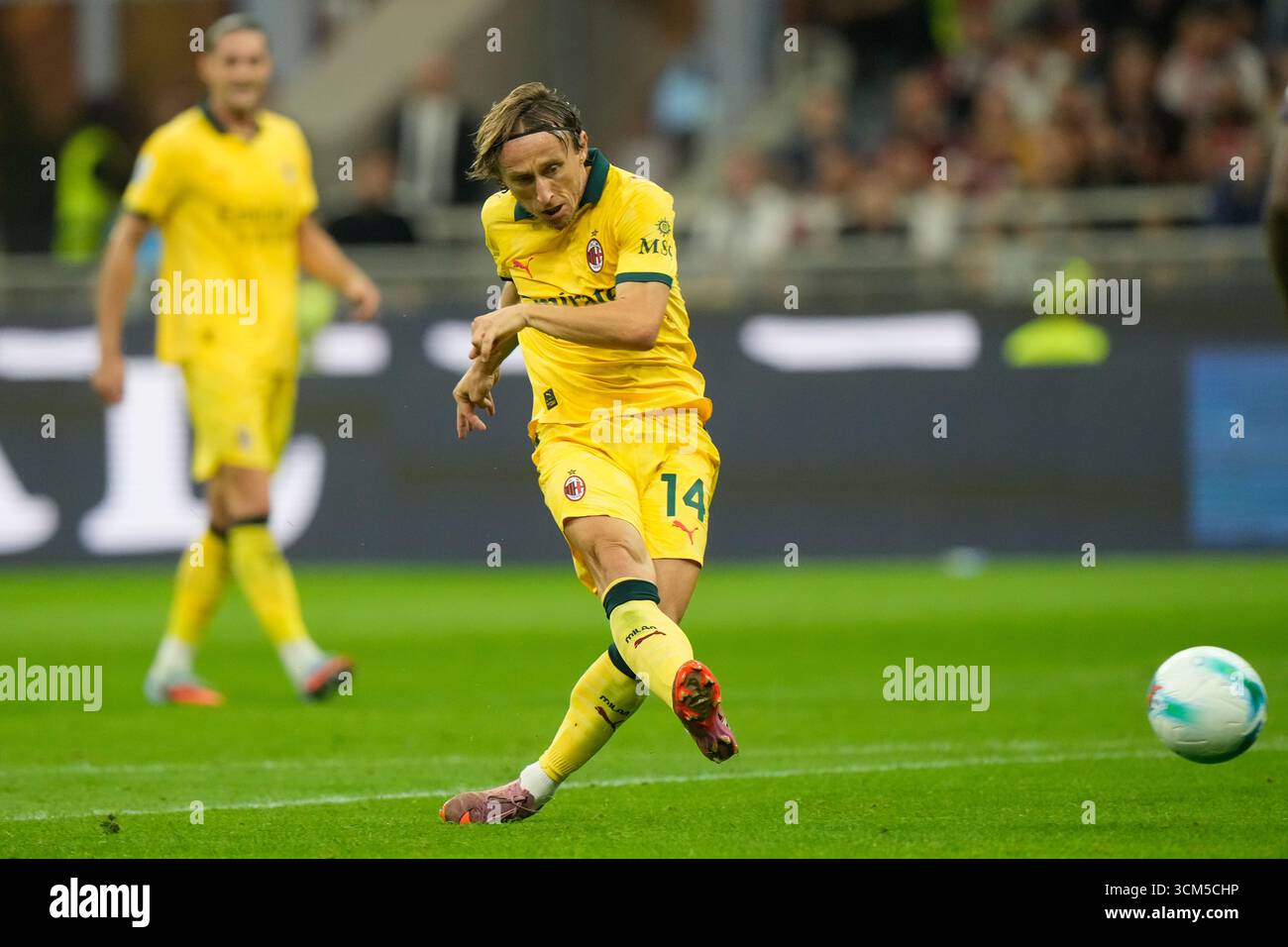 AC Milan's Luka Modric scores his side's opening goal from a penalty ...