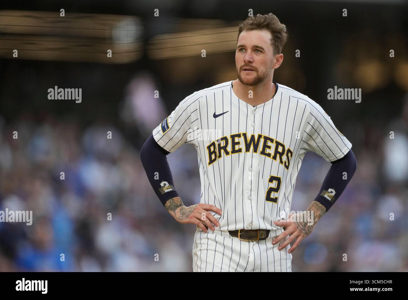 Milwaukee Brewers' Brice Turang looks on during the sixth inning of a ...
