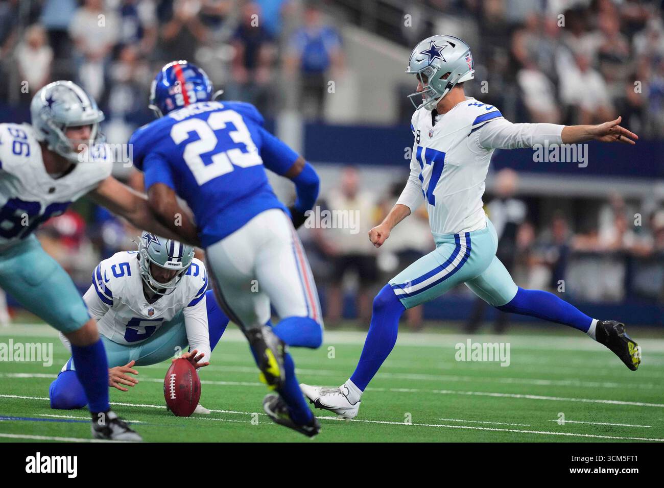 Dallas Cowboys' Brandon Aubrey (17) kicks a field goal under pressure ...