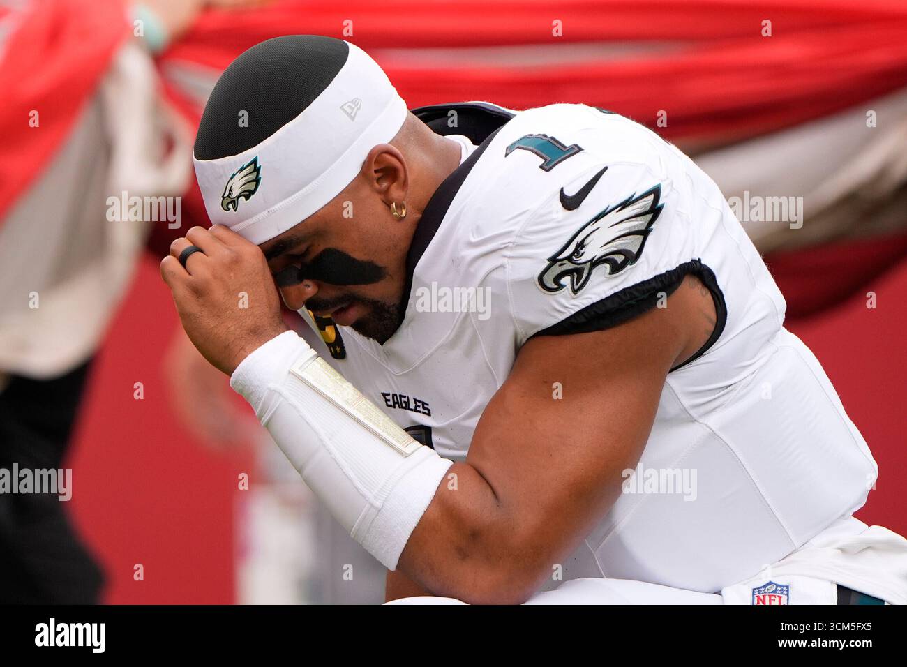 Philadelphia Eagles quarterback Jalen Hurts pauses before an NFL ...