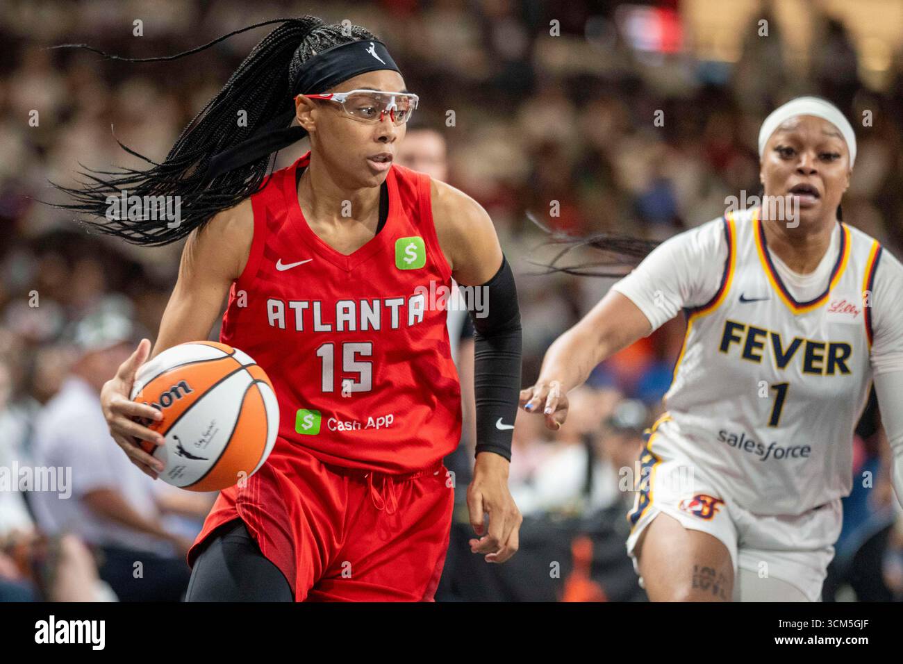 Atlanta Dream guard Allisha Gray, left, drives the ball during the ...