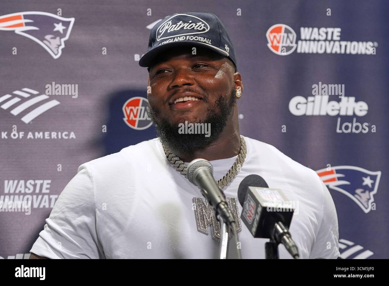 New England Patriots' Milton Williams talks after an NFL football game ...