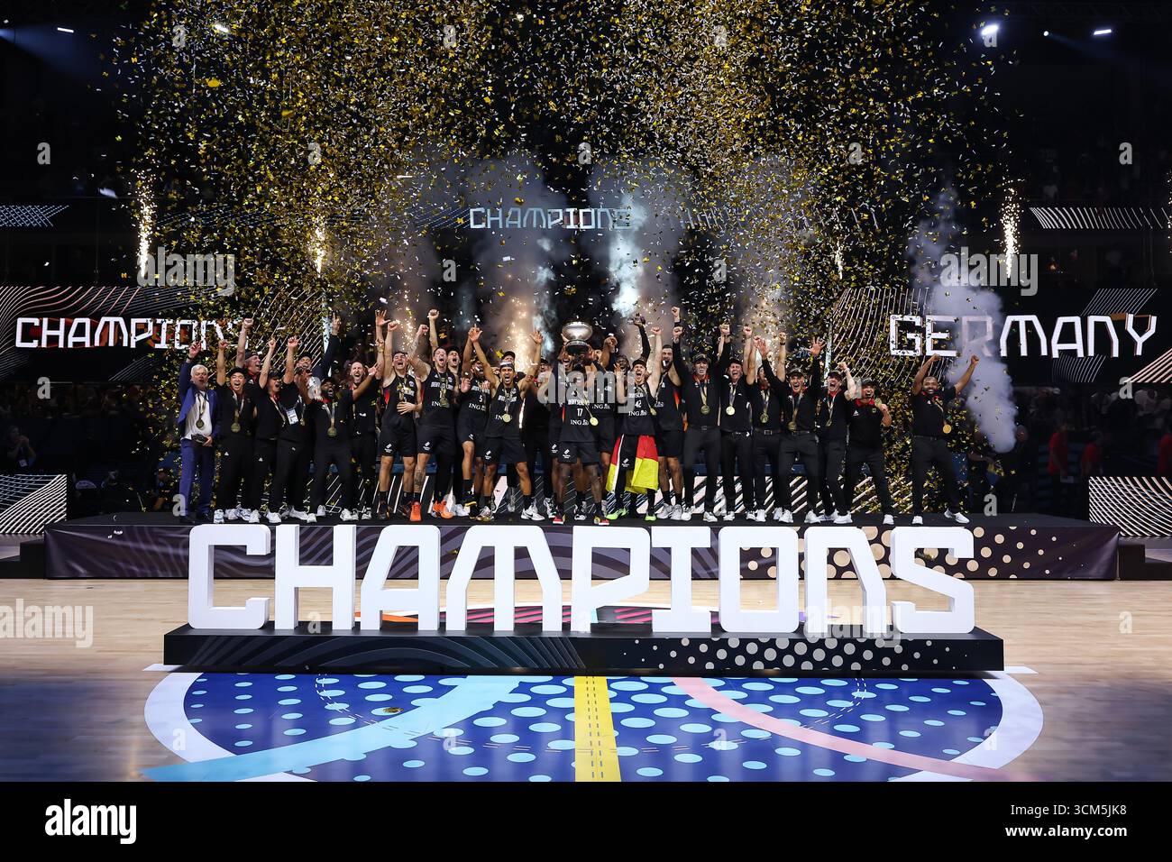 Players of Germany celebrate with trophy after defeating Turkey at the ...
