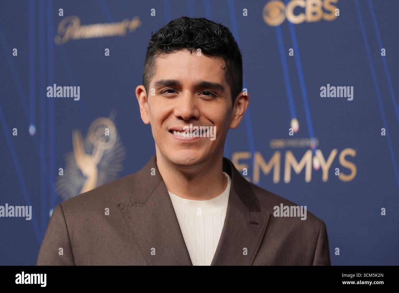 Patrick Gomez arrives at the 77th Primetime Emmy Awards on Sunday, Sept ...