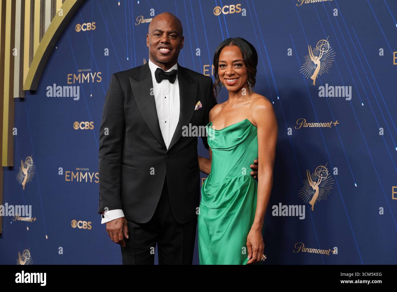 Kevin Frazier, left, and Nischelle Turner arrive at the 77th Primetime ...