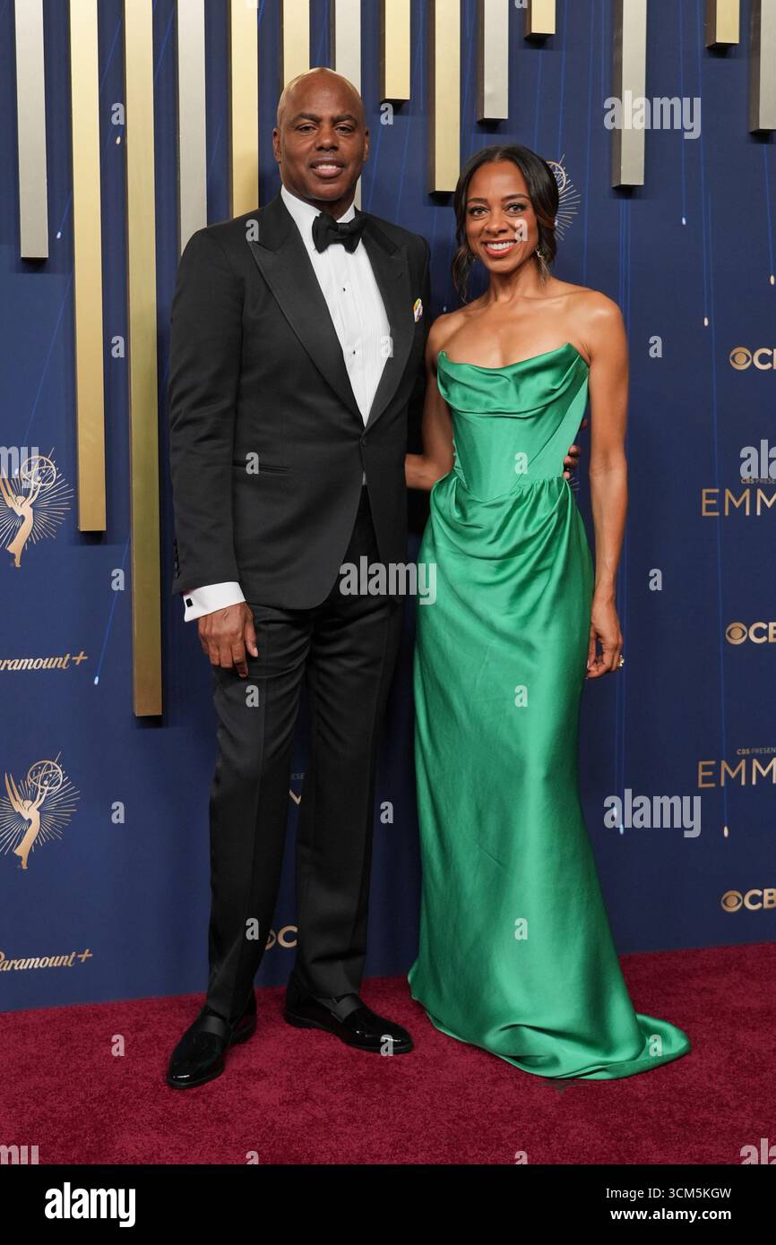 Kevin Frazier, left, and Nischelle Turner arrive at the 77th Primetime ...