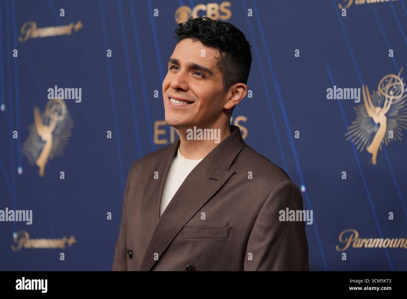 Patrick Gomez arrives at the 77th Primetime Emmy Awards on Sunday, Sept ...