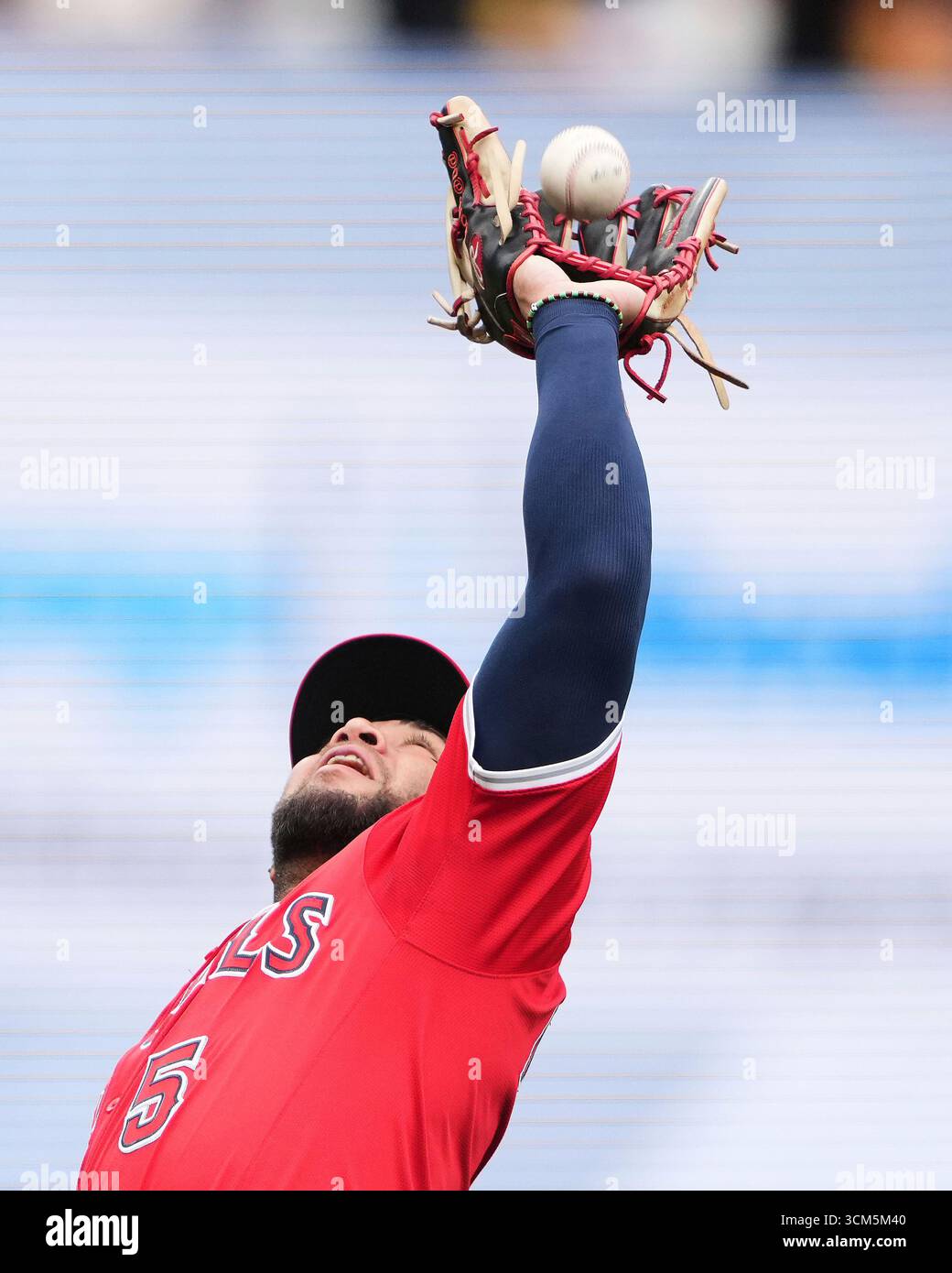 Los Angeles Angels third baseman Yoan Moncada catches a fly ball from ...