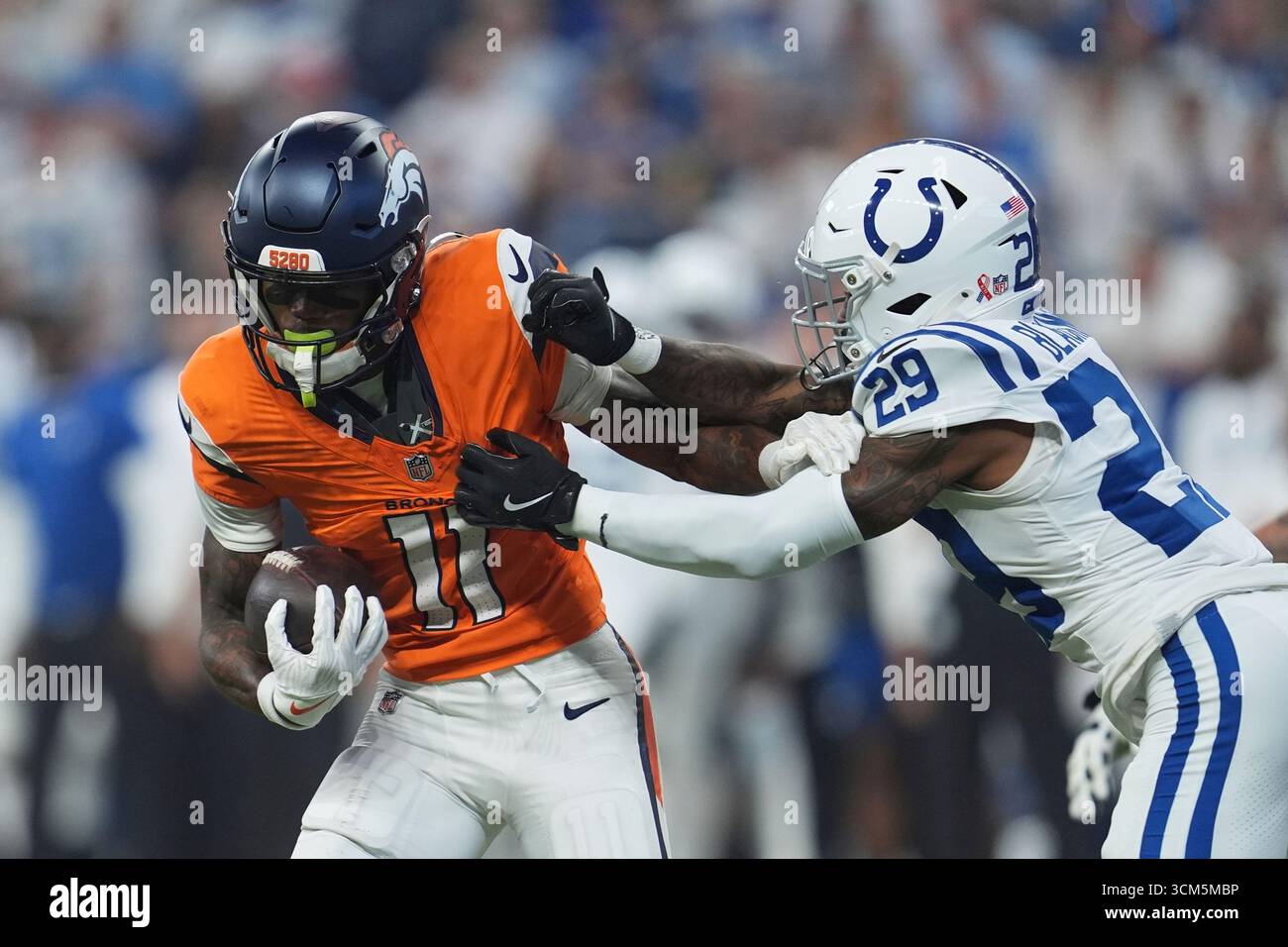 Denver Broncos wide receiver Troy Franklin (11) is tackled by ...