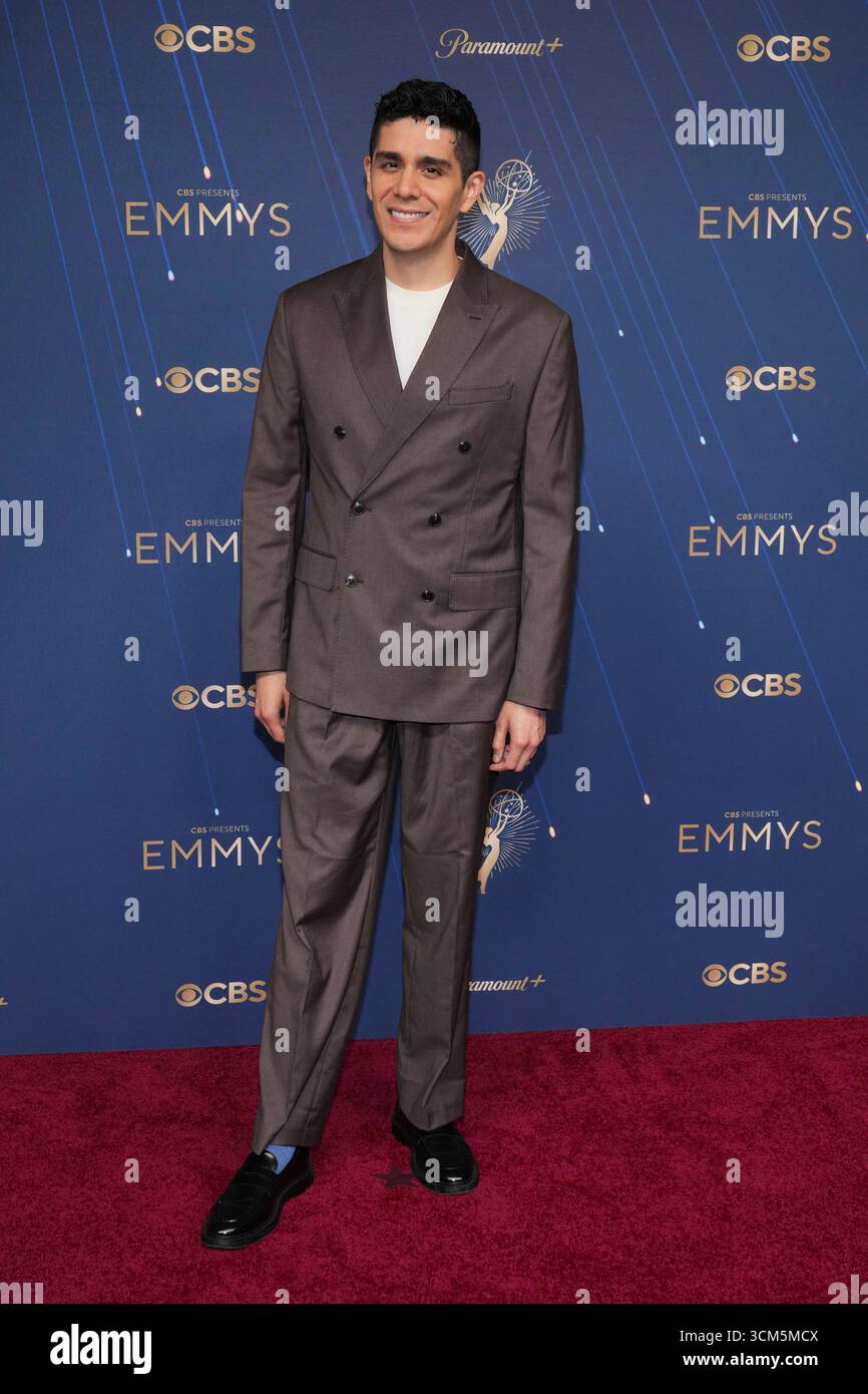 Patrick Gomez arrives at the 77th Emmy Awards on Sunday, Sept. 14, 2025 ...