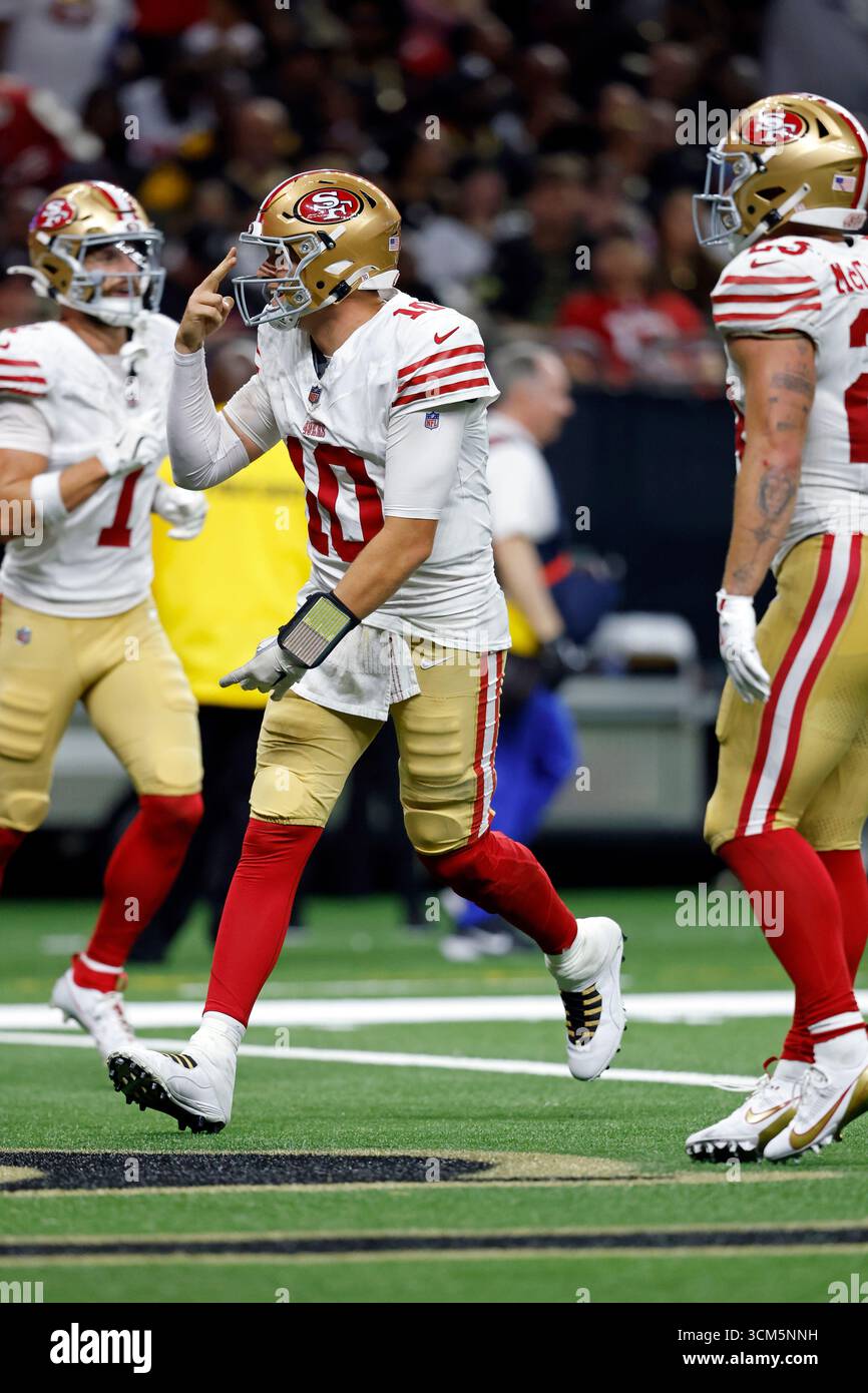 San Francisco 49ers quarterback Mac Jones (10) celebrates after a ...