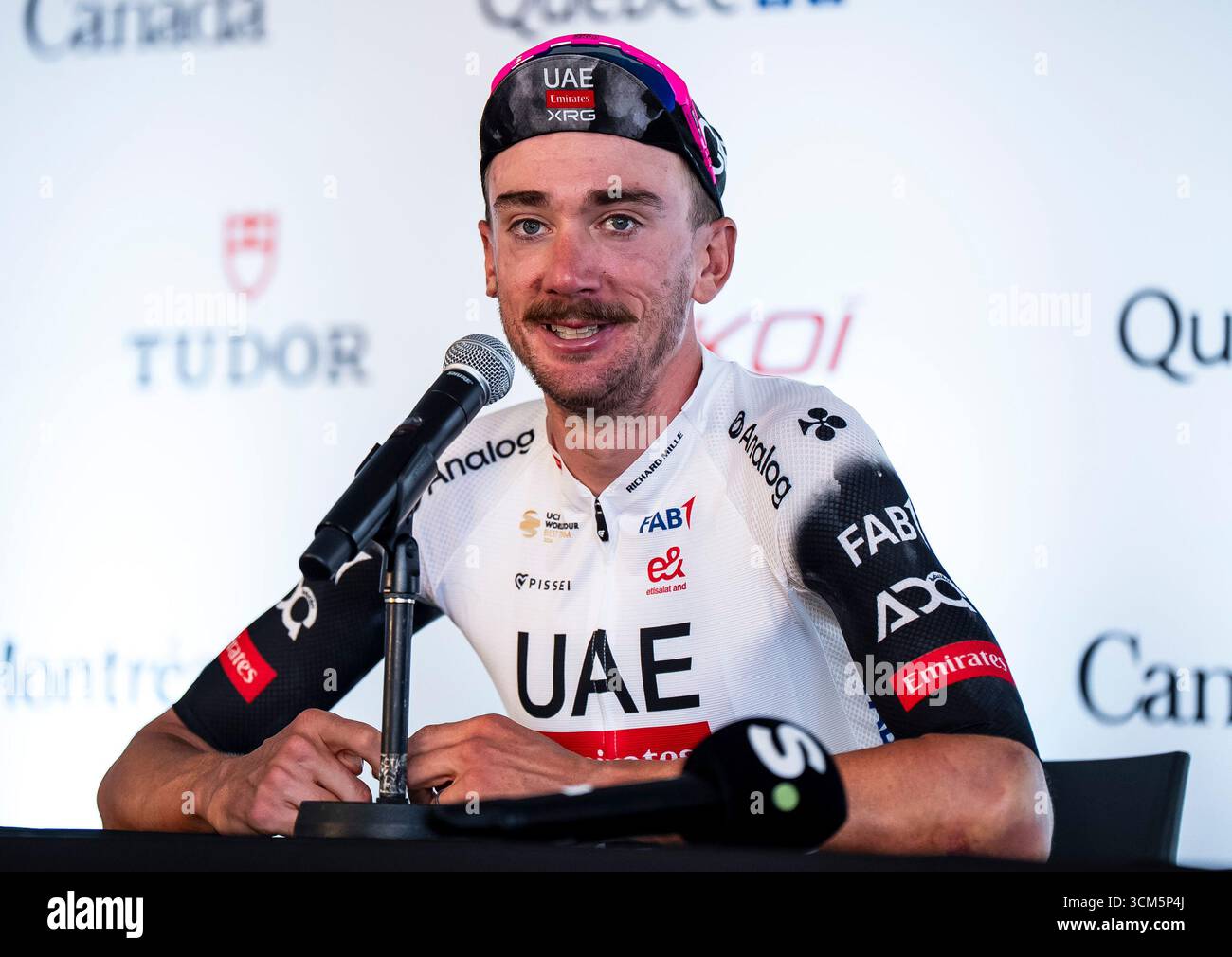 Brandon McNulty, of the United States, speaks to media after winning ...