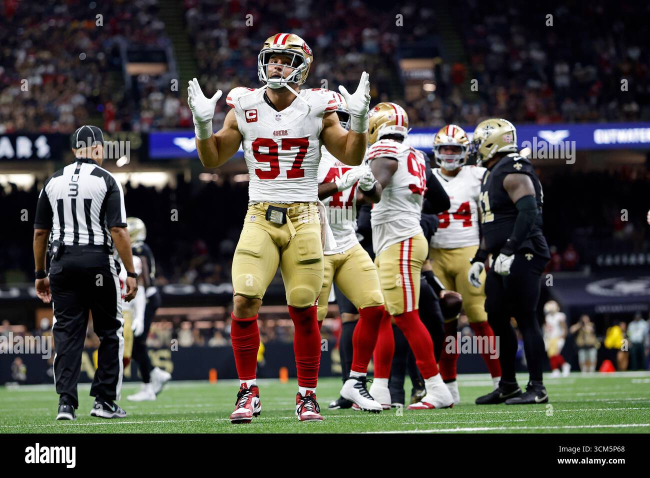 San Francisco 49ers defensive end Nick Bosa (97) reacts after a play ...