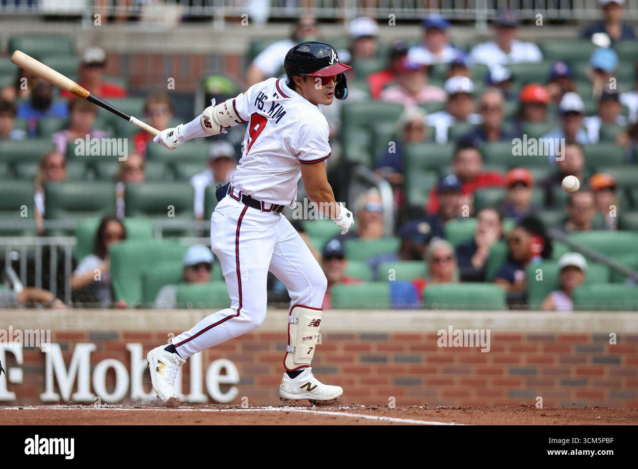 Atlanta Braves' Ha-Seong Kim hits an infield single in the second ...