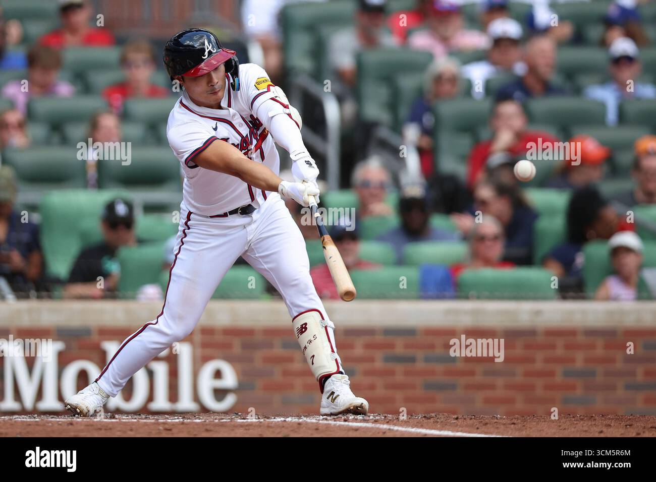 Atlanta Braves' Ha-Seong Kim hits a single in the third inning of a ...