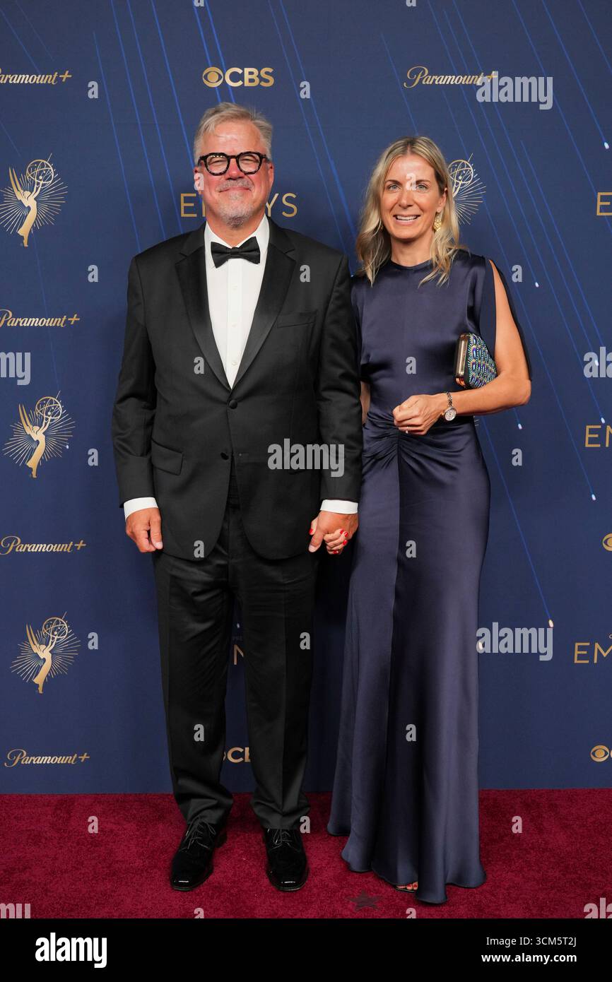 Alex Graves, left, and Lilly Graves arrive at the 77th Emmy Awards on ...