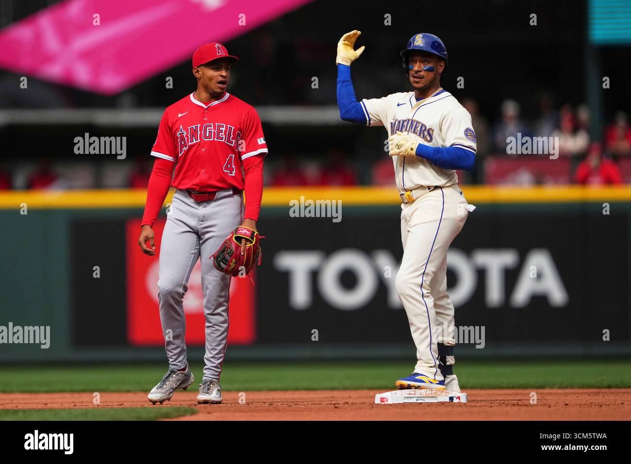 Seattle Mariners designated hitter Jorge Polanco reacts to hitting a ...