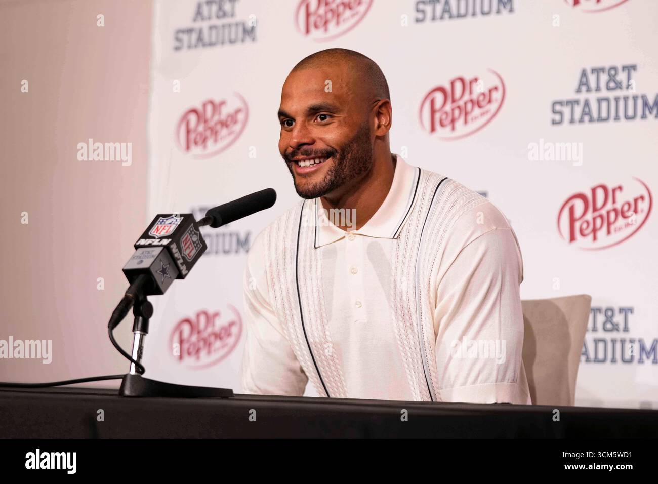 Dallas Cowboys quarterback Dak Prescott smiles during a news conference after the team's NFL ...