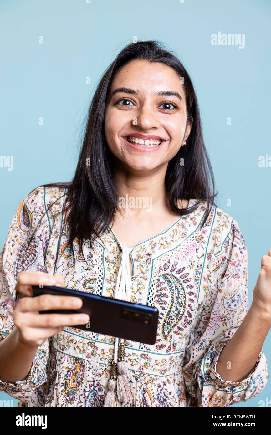 Smiling sport gamer girl hi-res stock photography and images - Alamy