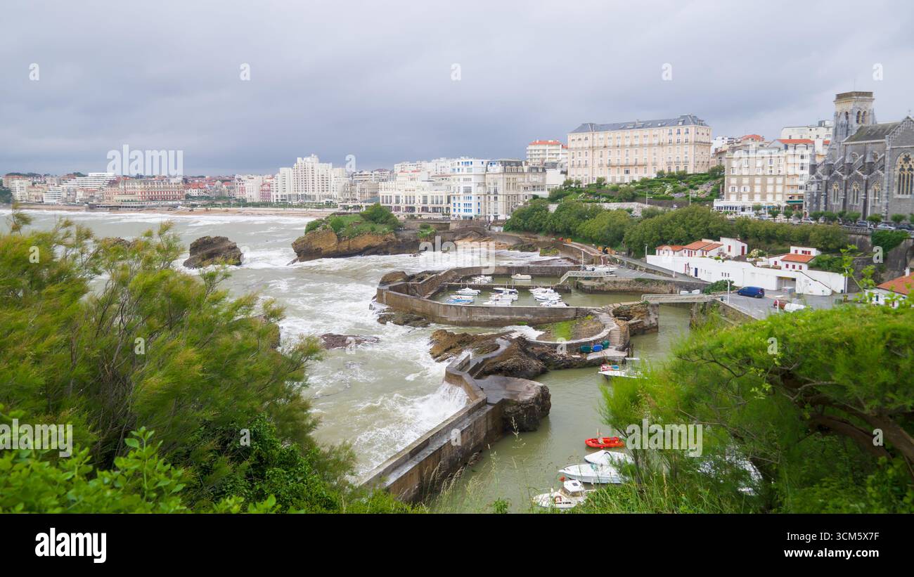 Coastal road in Biarritz near the Rocher de la Vierge with Atlantic ...