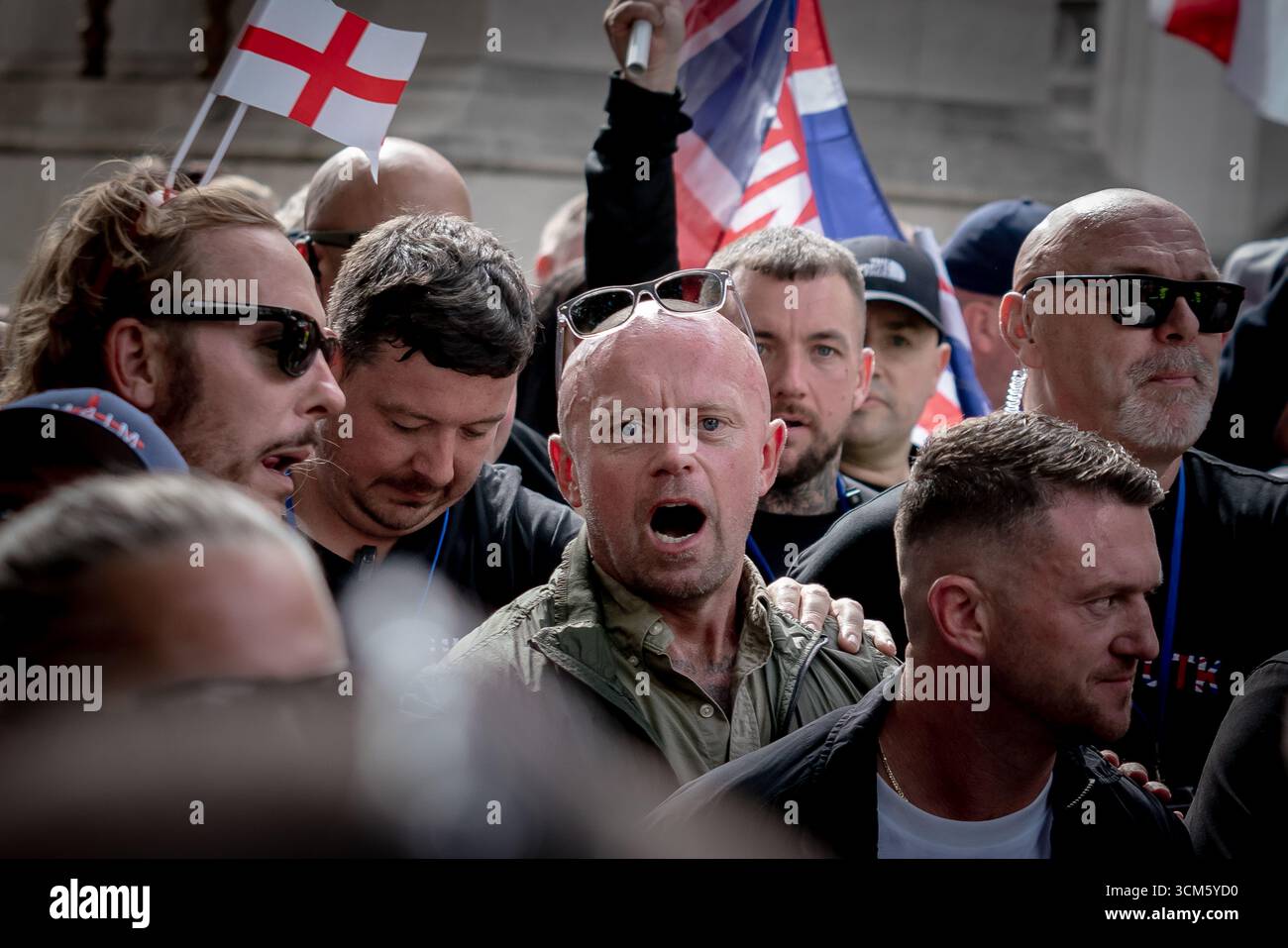 London, UK. 13th September, 2025. Liam Tuffs (centre) joins "Unite the ...