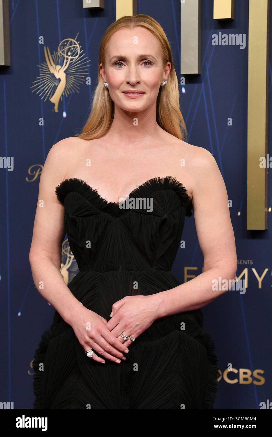 Genevieve O'Reilly arrives at the 77th Primetime Emmy Awards on Sunday ...