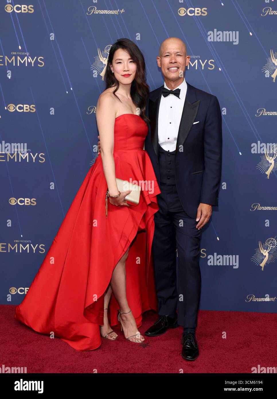 Marian Wang, left, and Vladimir Duthiers arrive at the 77th Emmy Awards ...