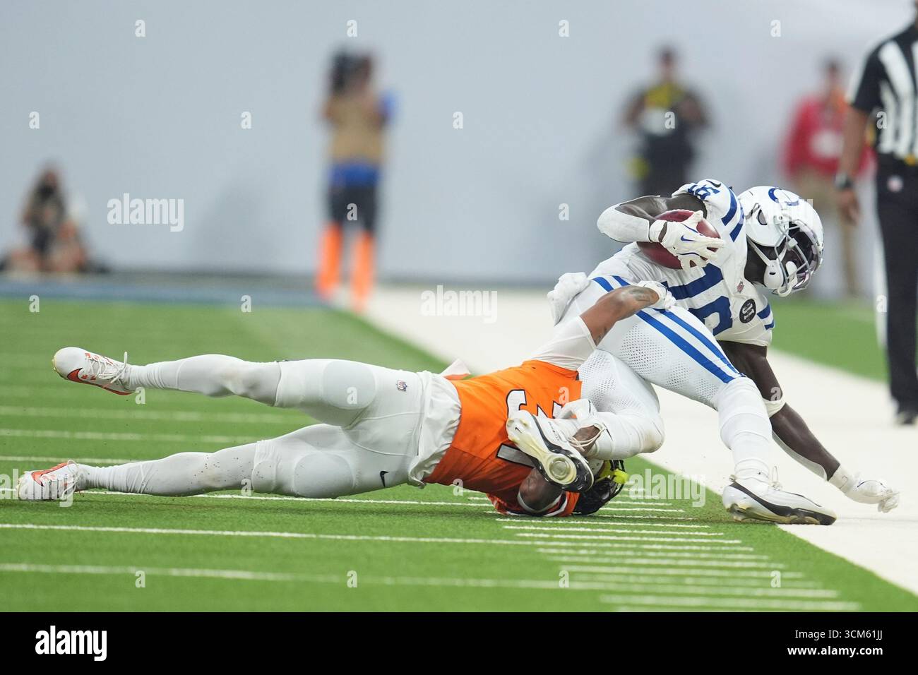 Indianapolis Colts wide receiver Ashton Dulin (16) is tackled by Denver ...