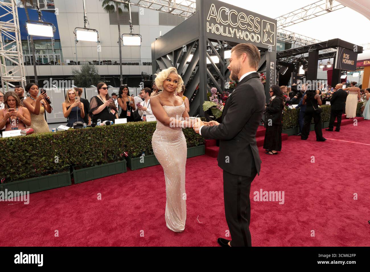 Phaedra Parks, from left, and Derek Hough walk the red carpet at the ...