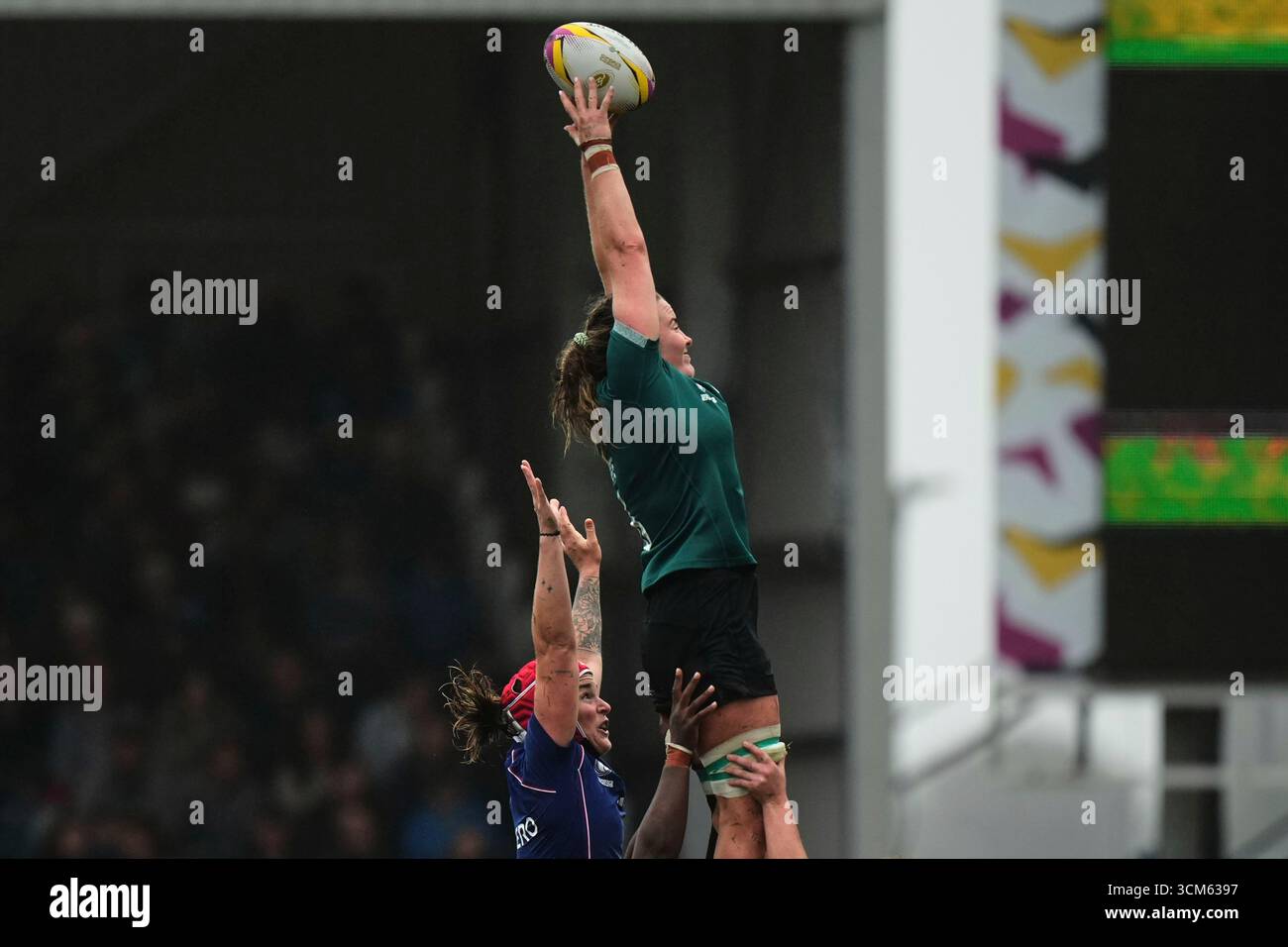 Ireland's Fiona Tuite, top, fails to catch the ball in the line out ...